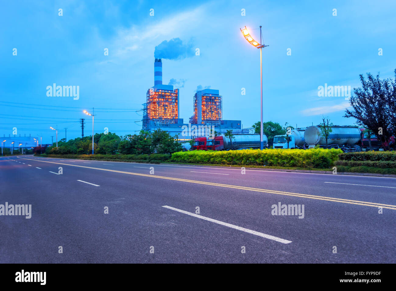 high way road near a power powerplant Stock Photo - Alamy