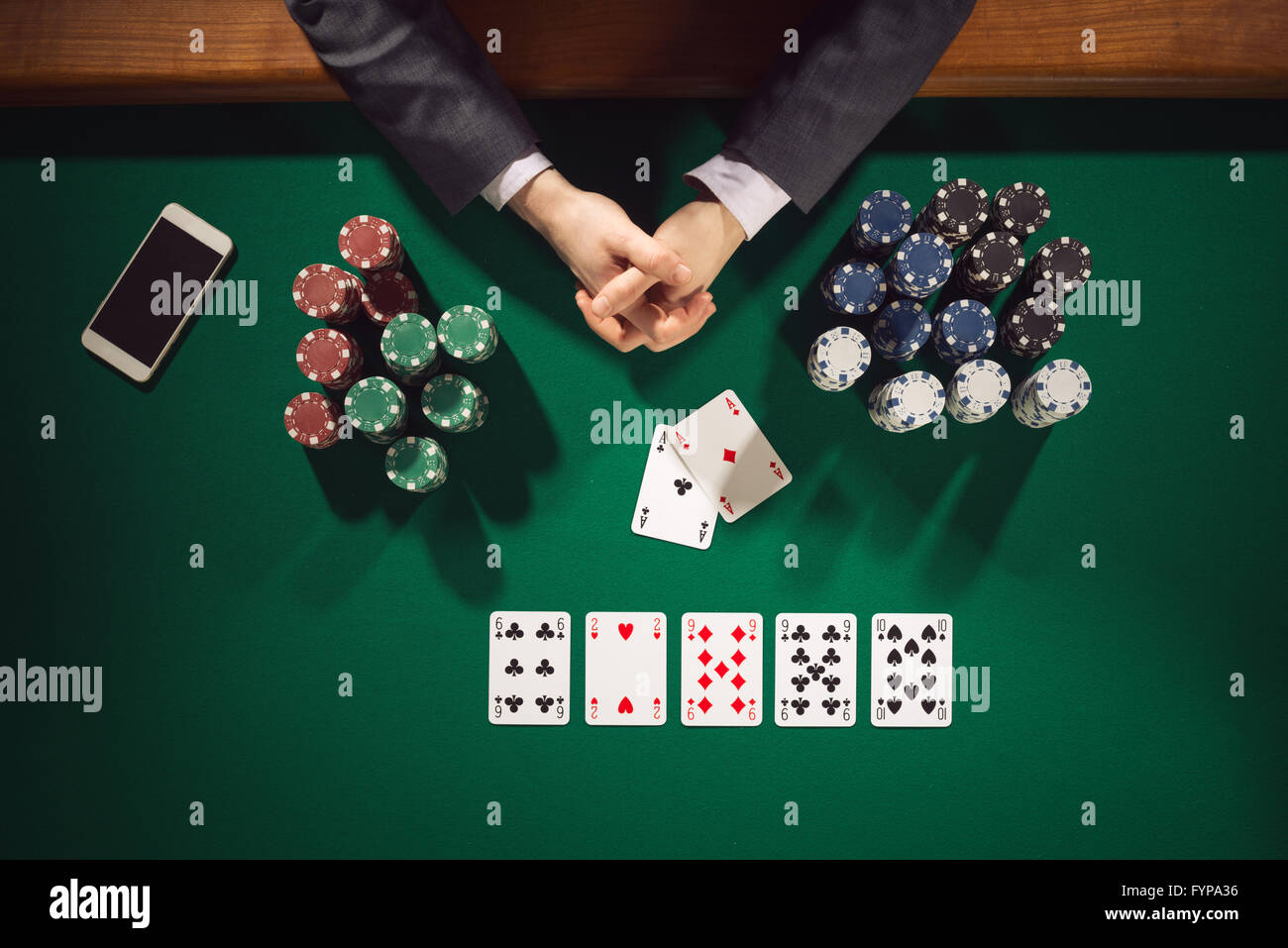 Poker hands hi-res stock photography and images - Alamy