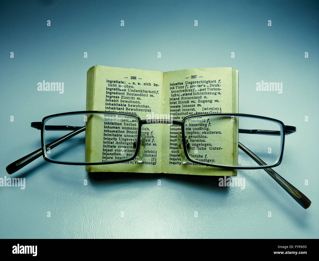 Eyeglasses on dictionary hi-res stock photography and images - Alamy