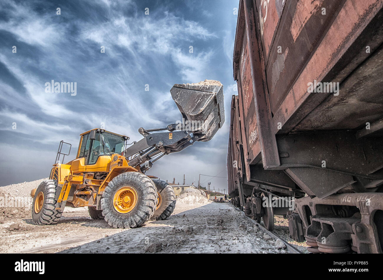 Excavator loader with backhoe works Stock Photo - Alamy