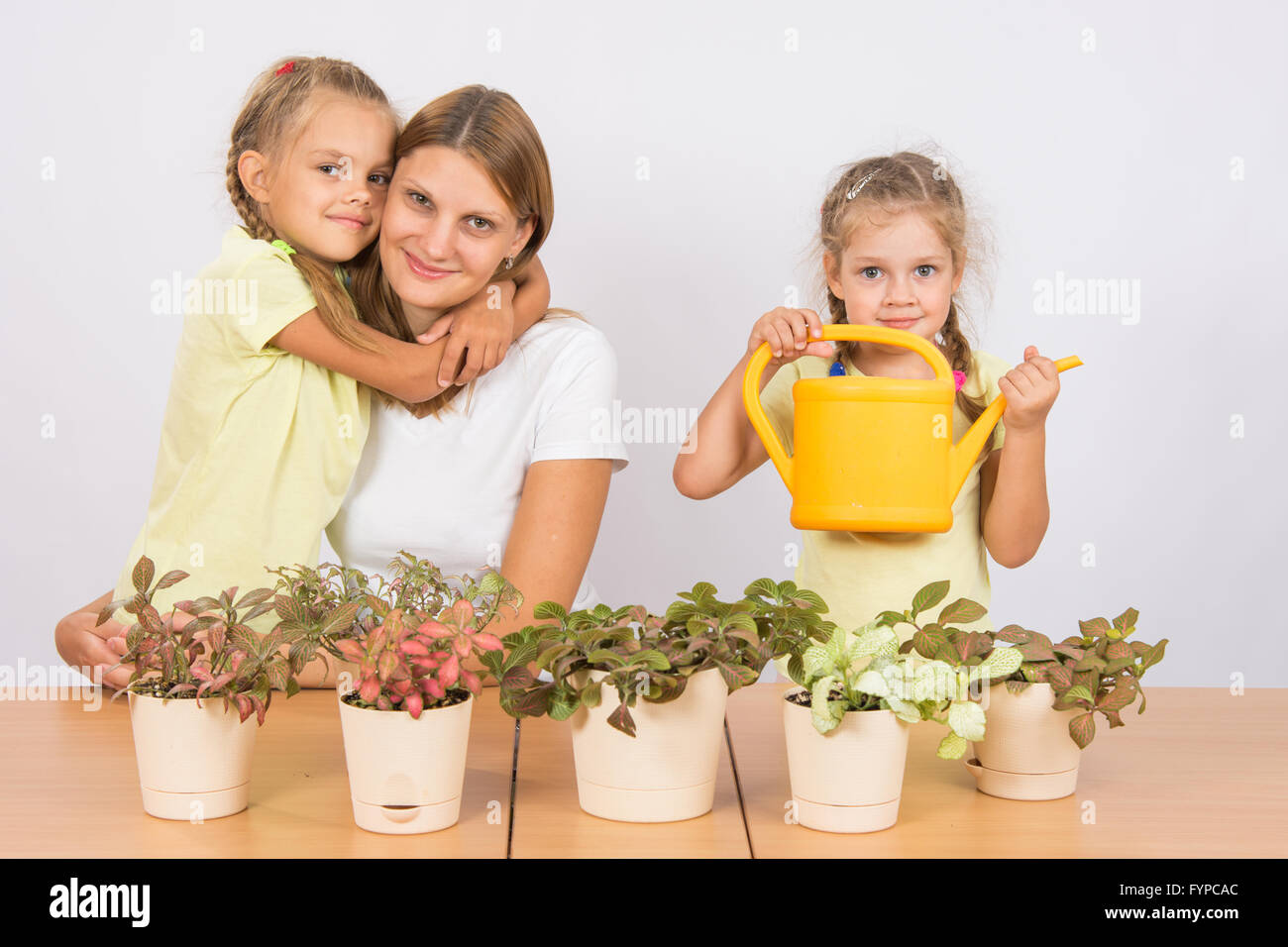 The family loves to grow houseplants Stock Photo - Alamy