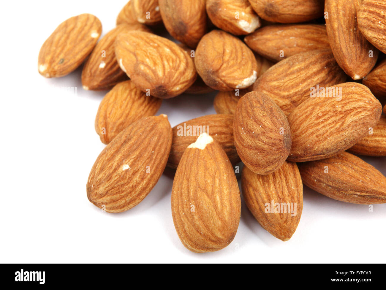 Almond nuts isolated Stock Photo - Alamy