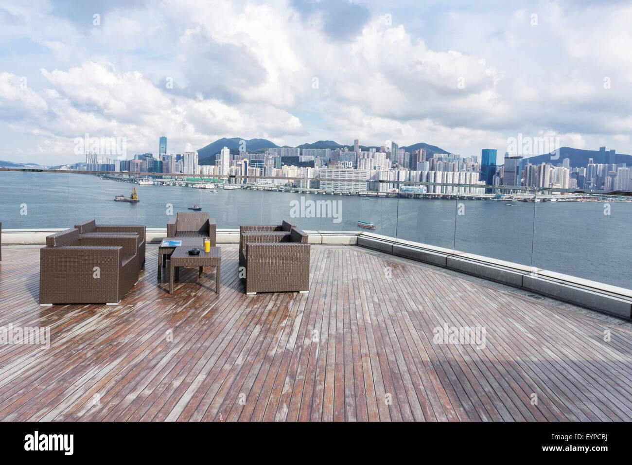 tea table and chairs besides a river Stock Photo - Alamy