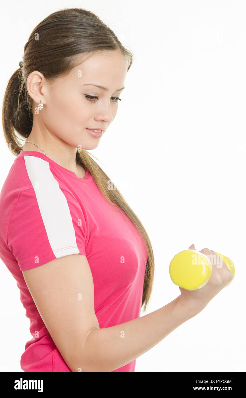 She shakes the muscles of the right hand Stock Photo - Alamy