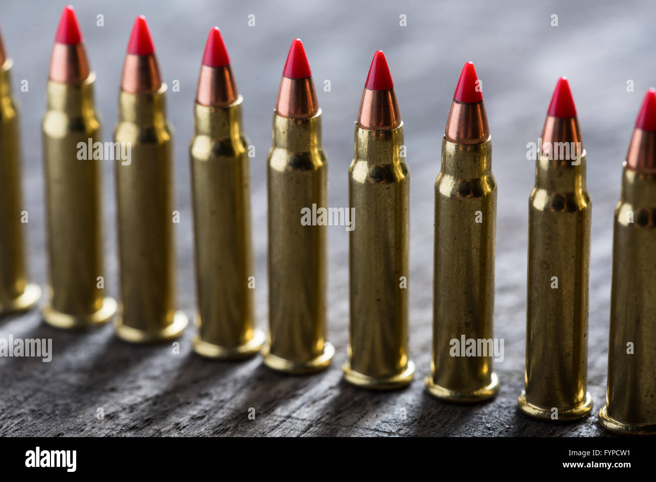 Cartridges ranked with red tip Stock Photo - Alamy