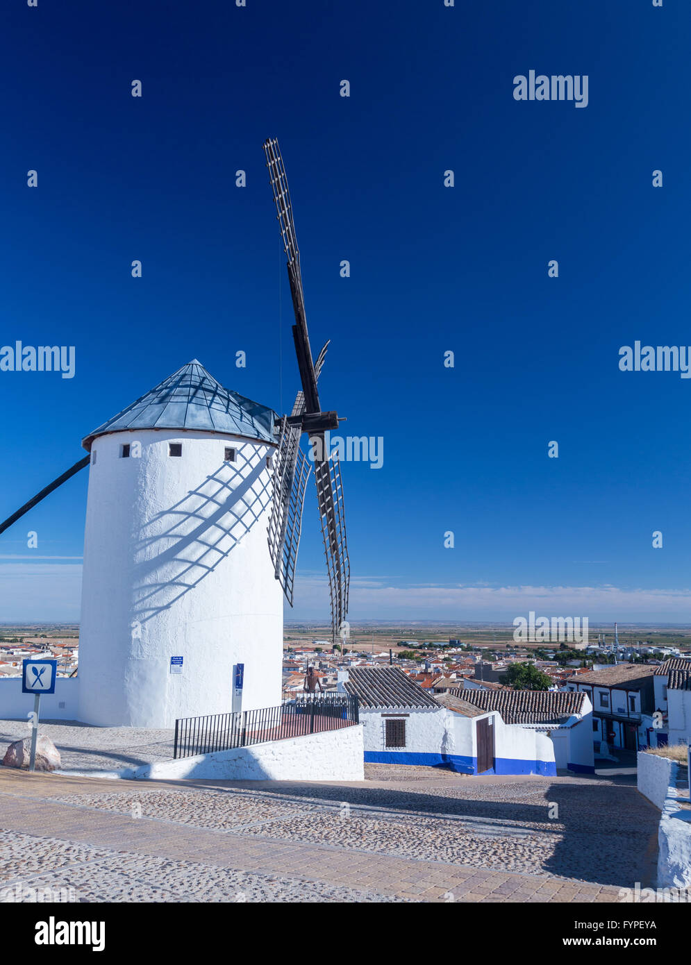 Windmill and town of Campo de Criptana La Mancha, Spain Stock Photo - Alamy
