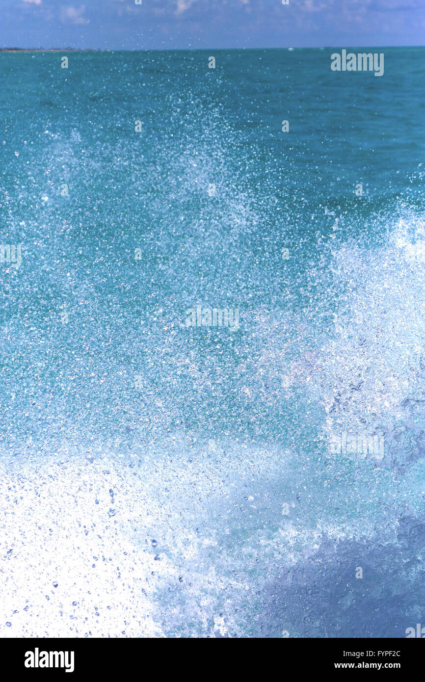 wave in mexico froath and blue day Stock Photo - Alamy