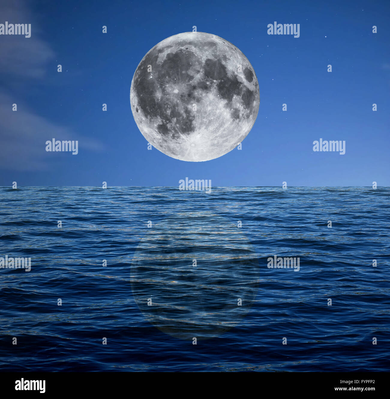Full moon at night over the sea Stock Photo - Alamy