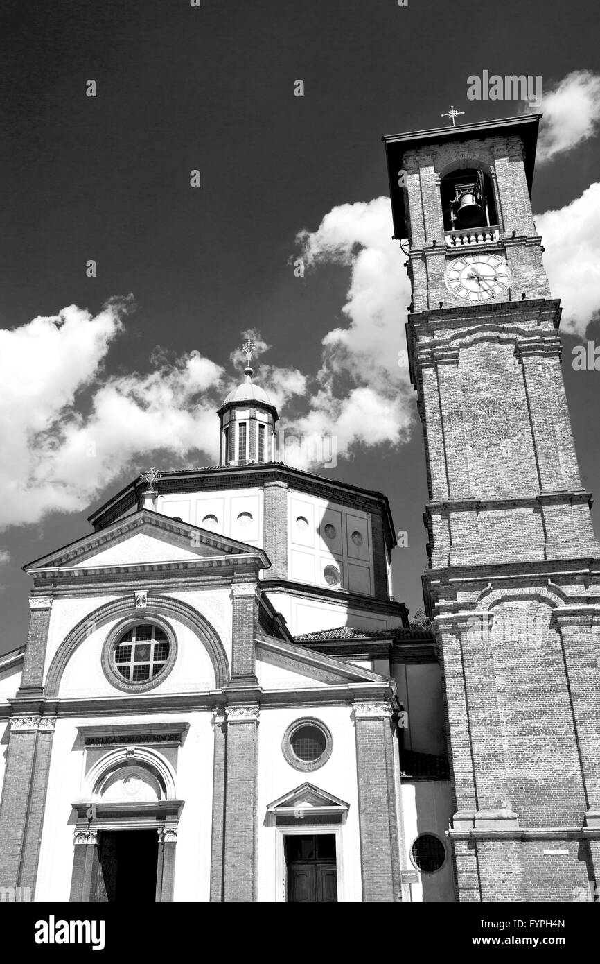 monument clock tower in italy europe old stone and bell Stock Photo - Alamy