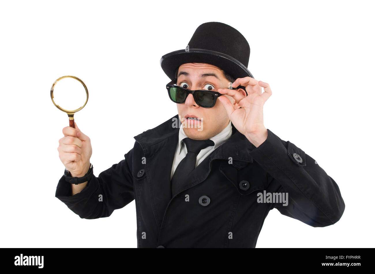 Young detective in black coat holding magnifying glass isolated Stock ...