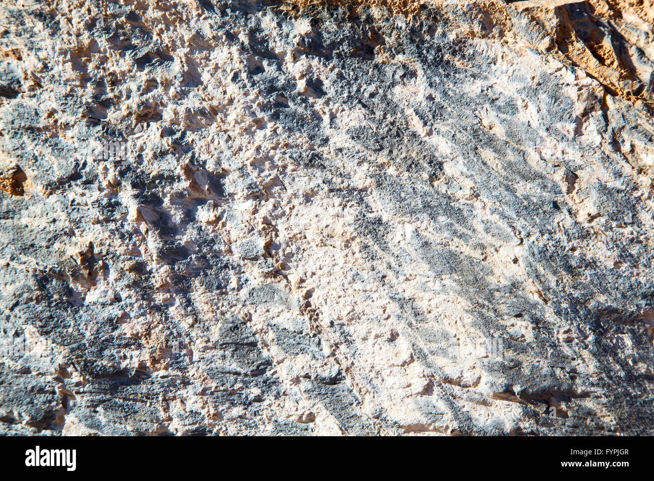 dirty stone in italy white gray rock and texture Stock Photo - Alamy