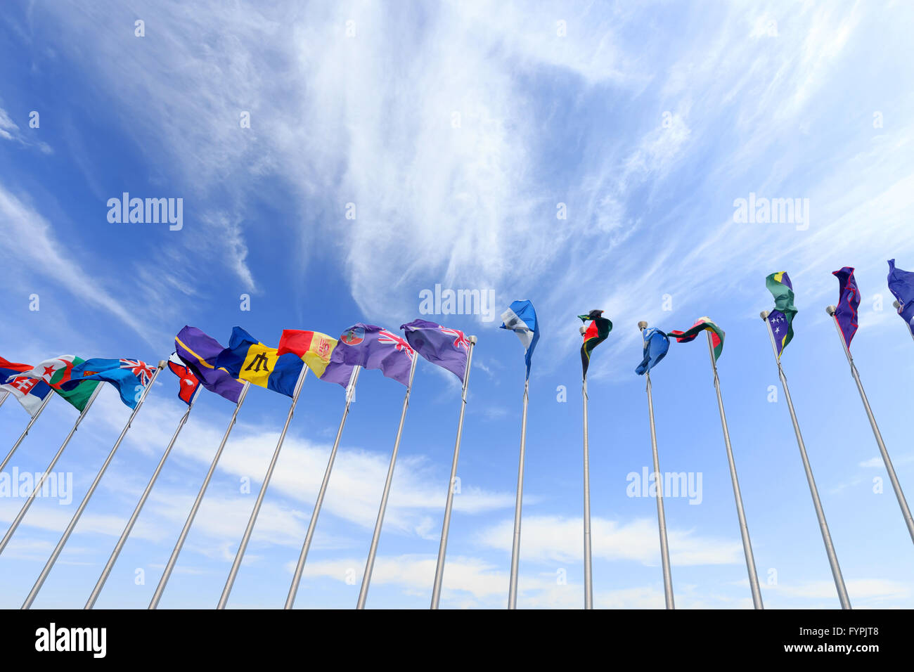 flags in blue sky Stock Photo - Alamy
