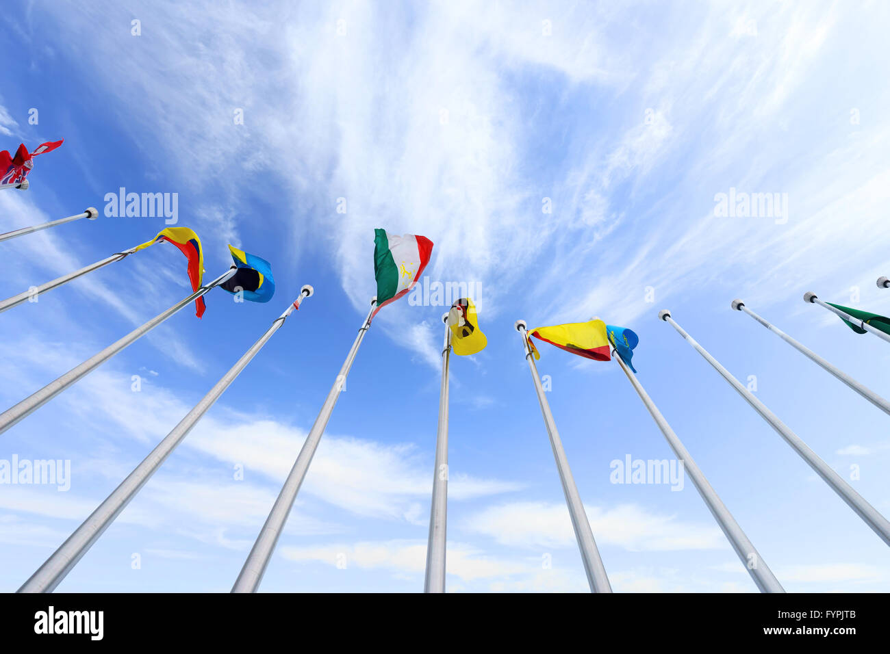 flags in blue sky Stock Photo - Alamy