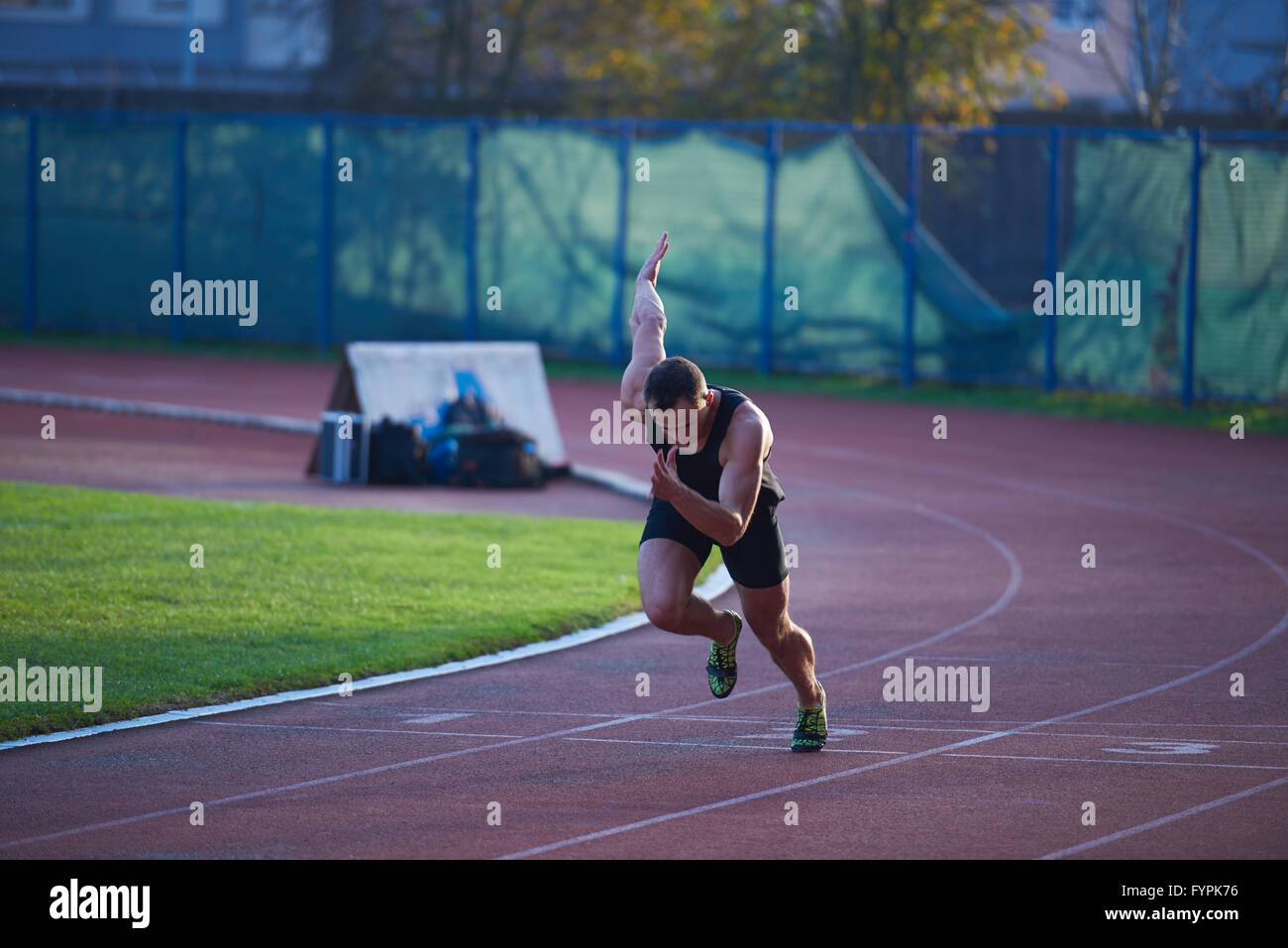 Athletic man start Stock Photo - Alamy