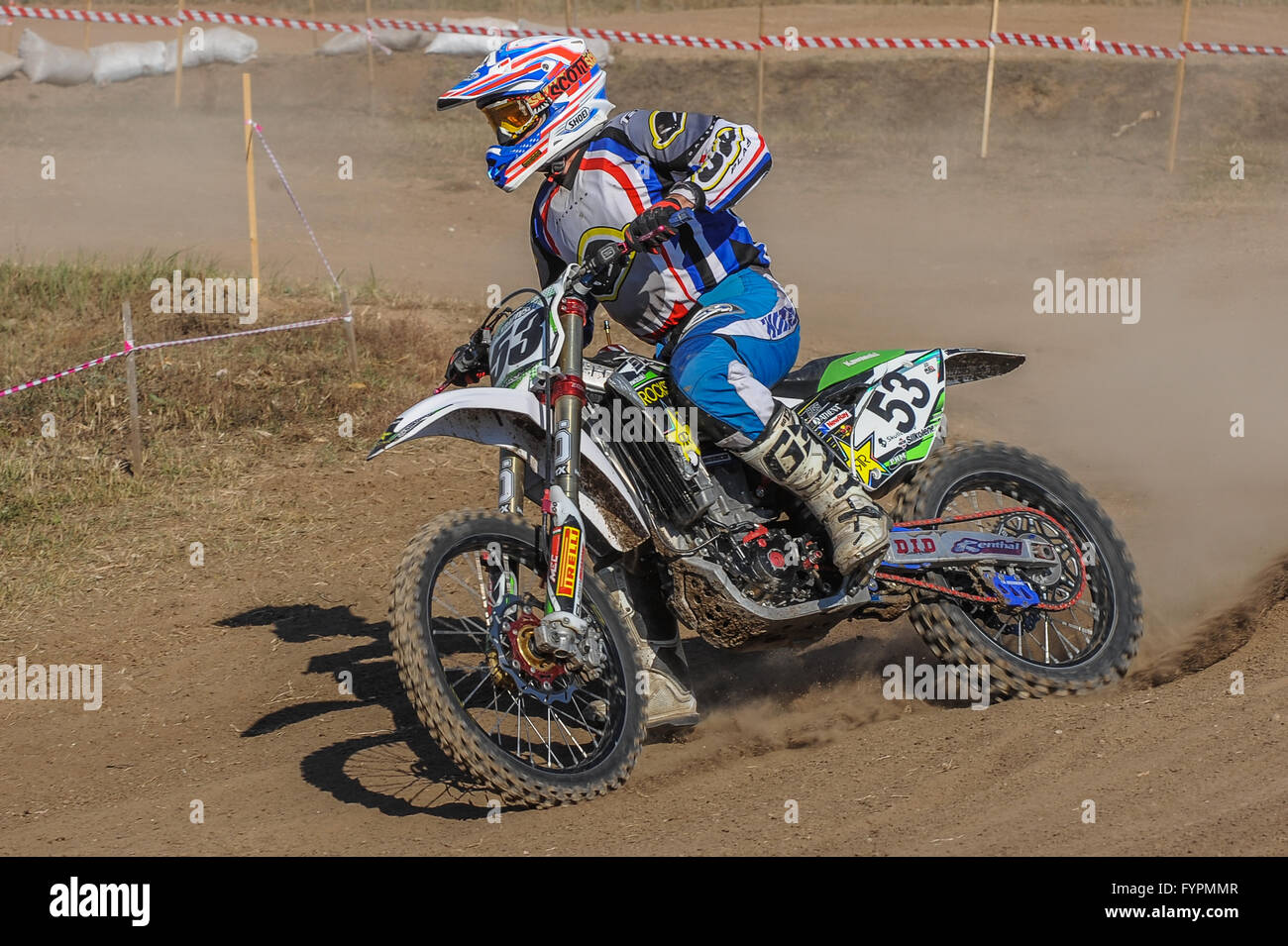 Motocross rider on a track Stock Photo - Alamy