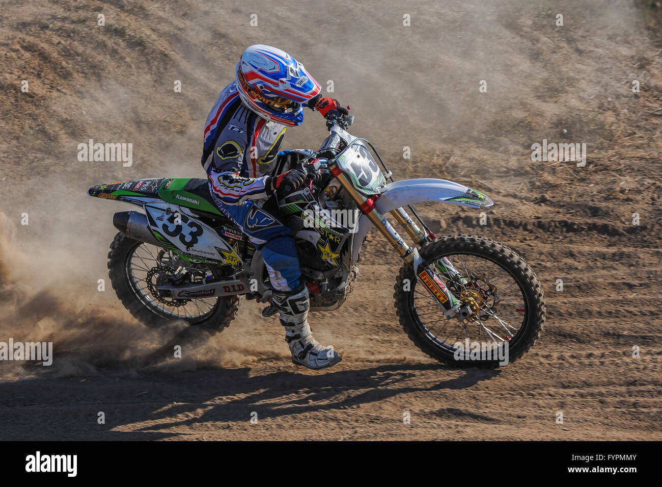 Motocross rider on a track Stock Photo - Alamy