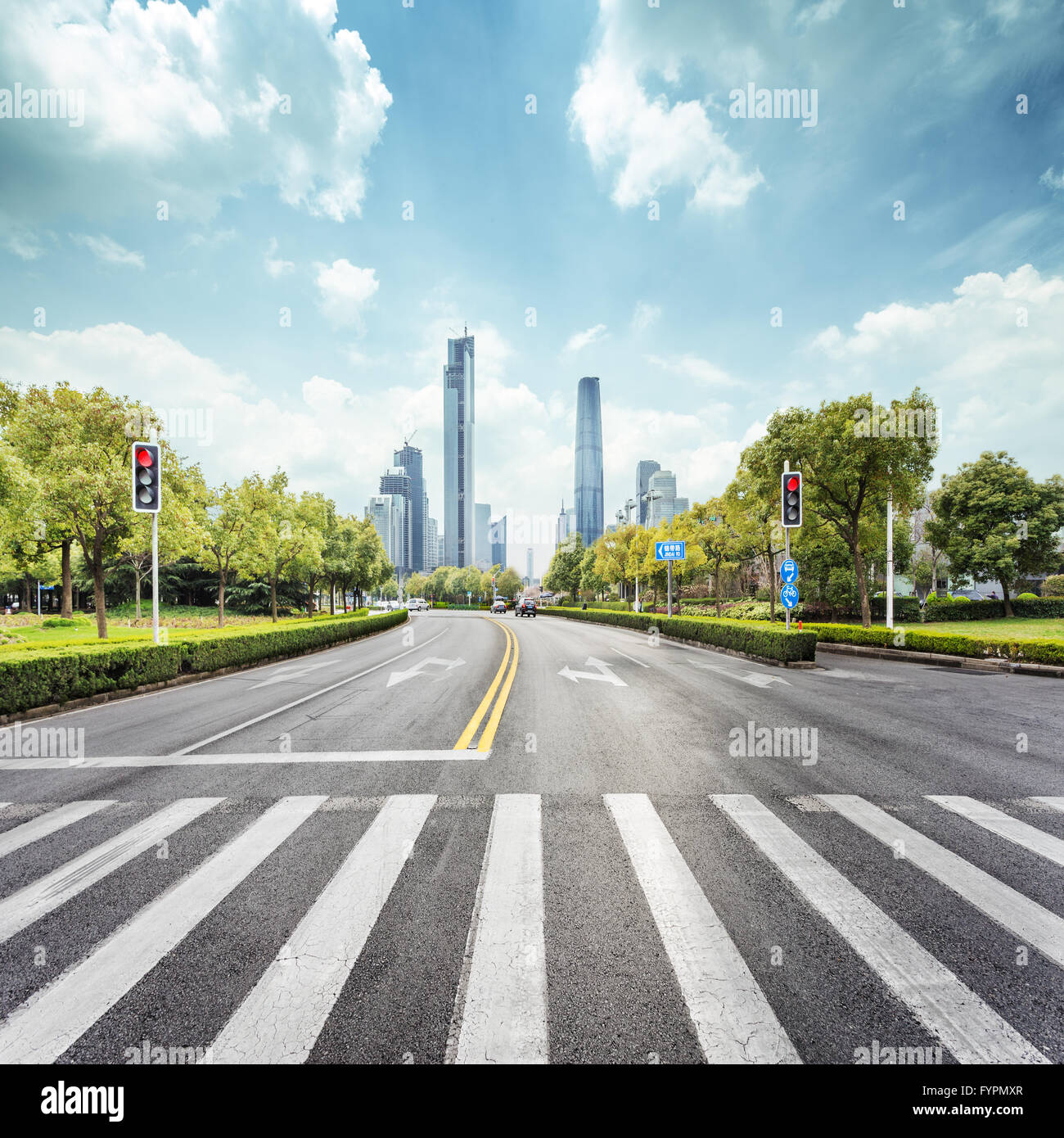 empty road with zebra crossing and skyscrapers Stock Photo - Alamy
