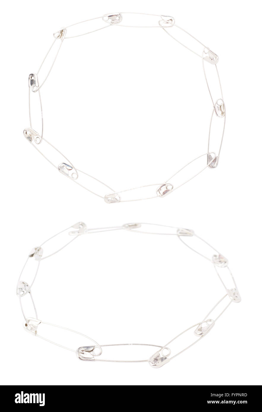 Round frame made of safety pins isolated on white background, set of ...