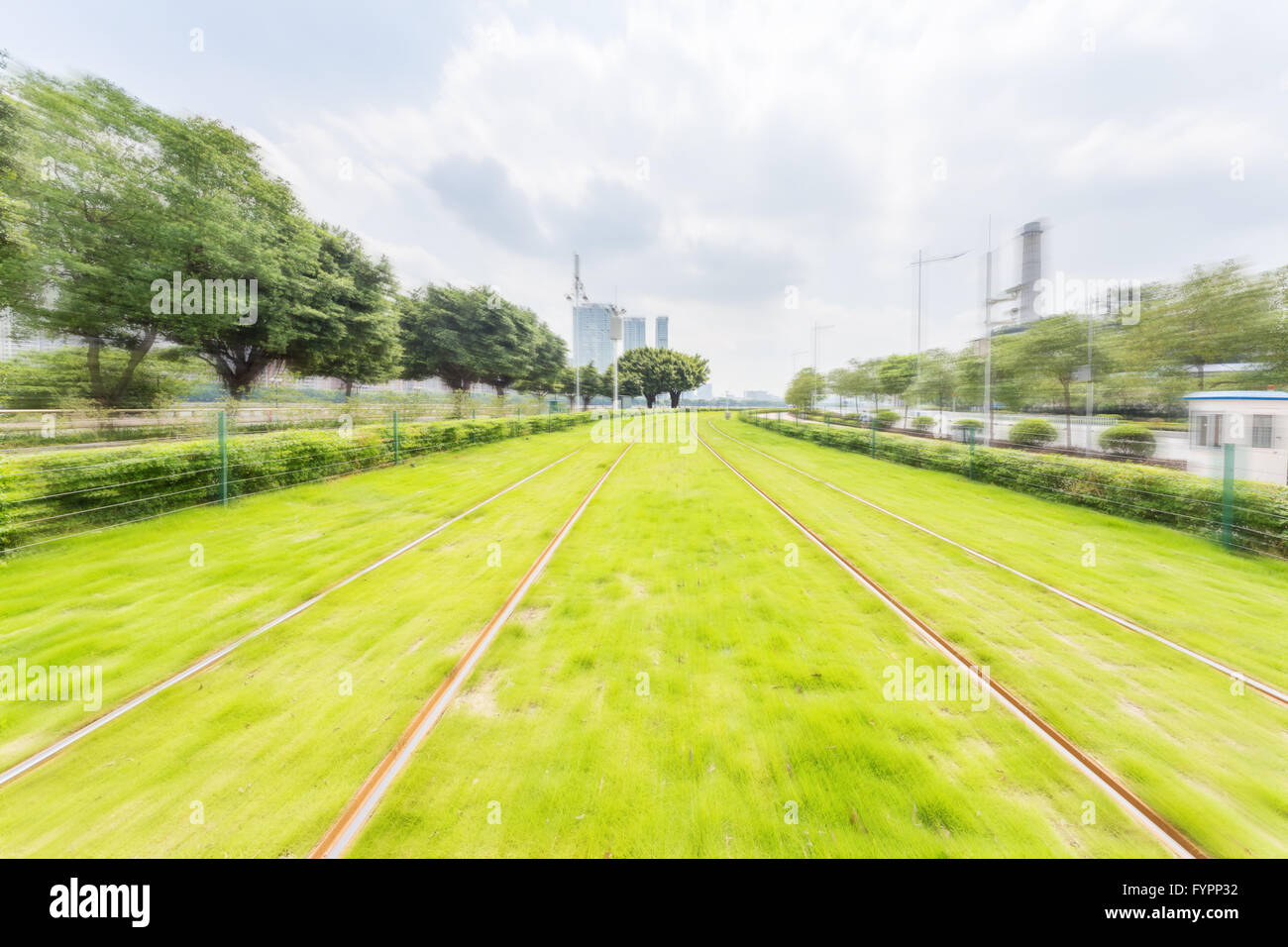railways along with trees and greenland Stock Photo - Alamy