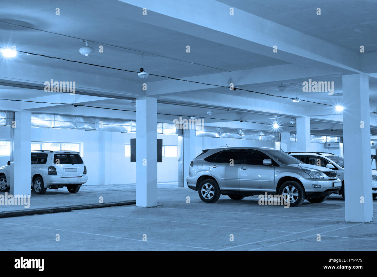 underground parking, blue toning Stock Photo - Alamy
