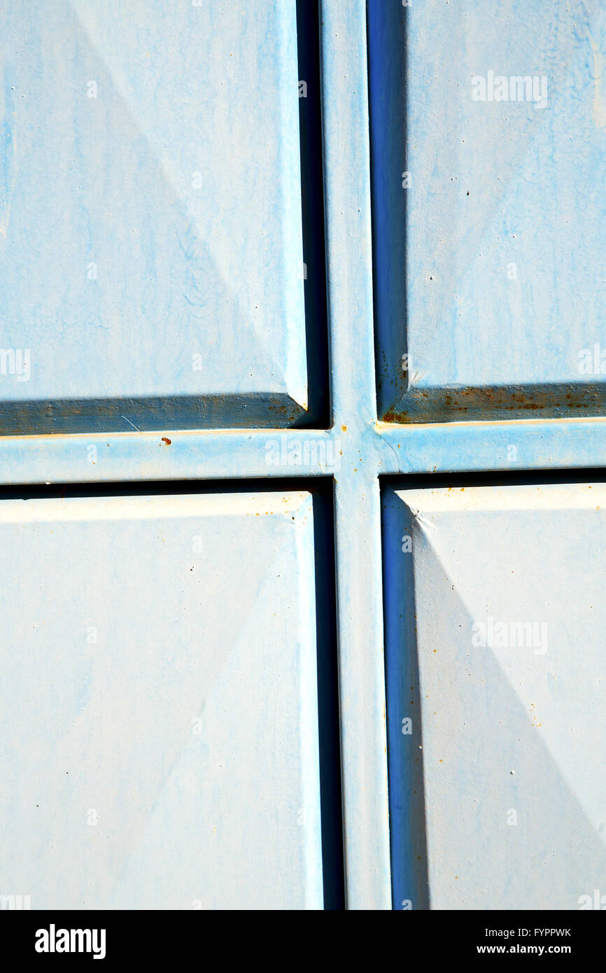 blue hinges in africa the old and safe padlock Stock Photo - Alamy