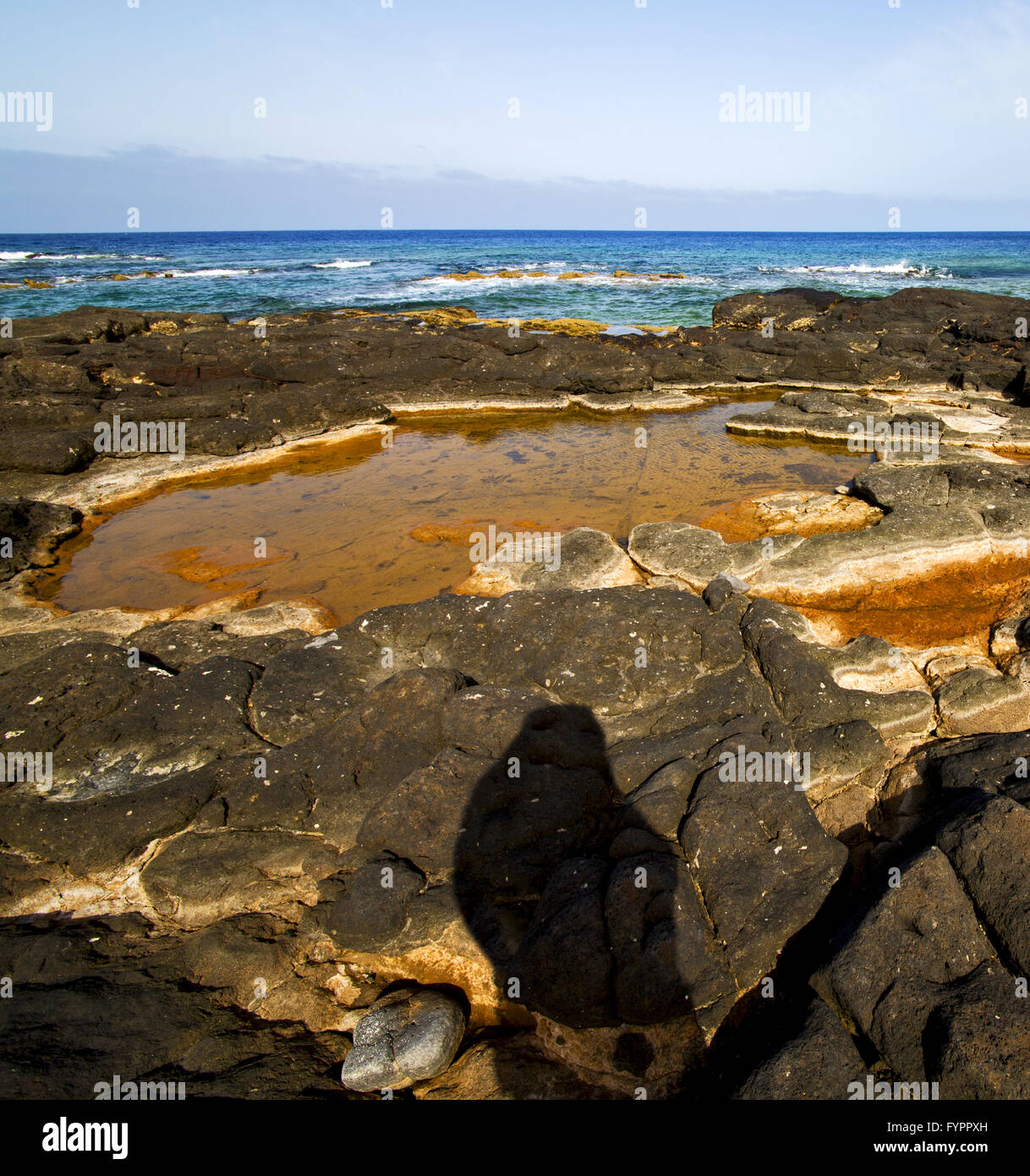 in spain lanzarote rock stone sky cloud beach Stock Photo - Alamy