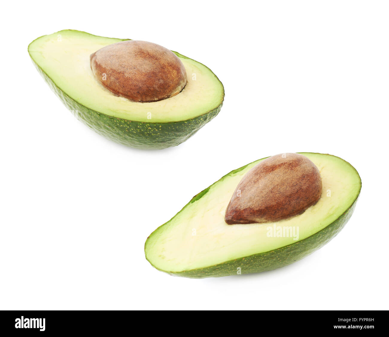 Cut in half open avocado fruit Stock Photo - Alamy