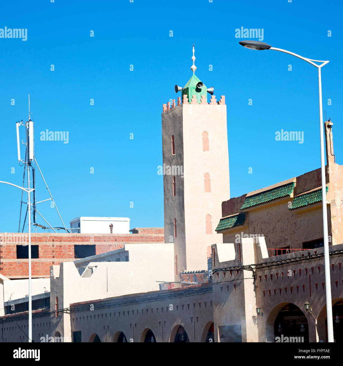 old brick tower in morocco africa village and the sky Stock Photo - Alamy