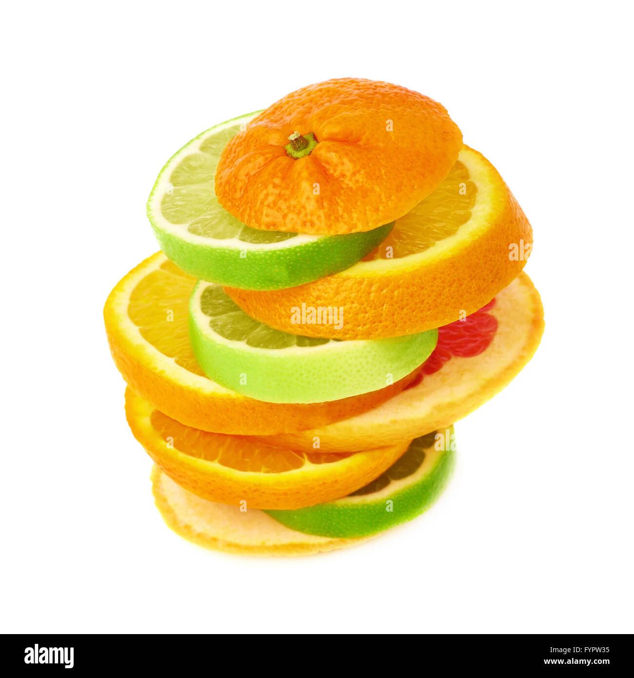 Stack of citrus sliced fruits over white isolated background Stock ...