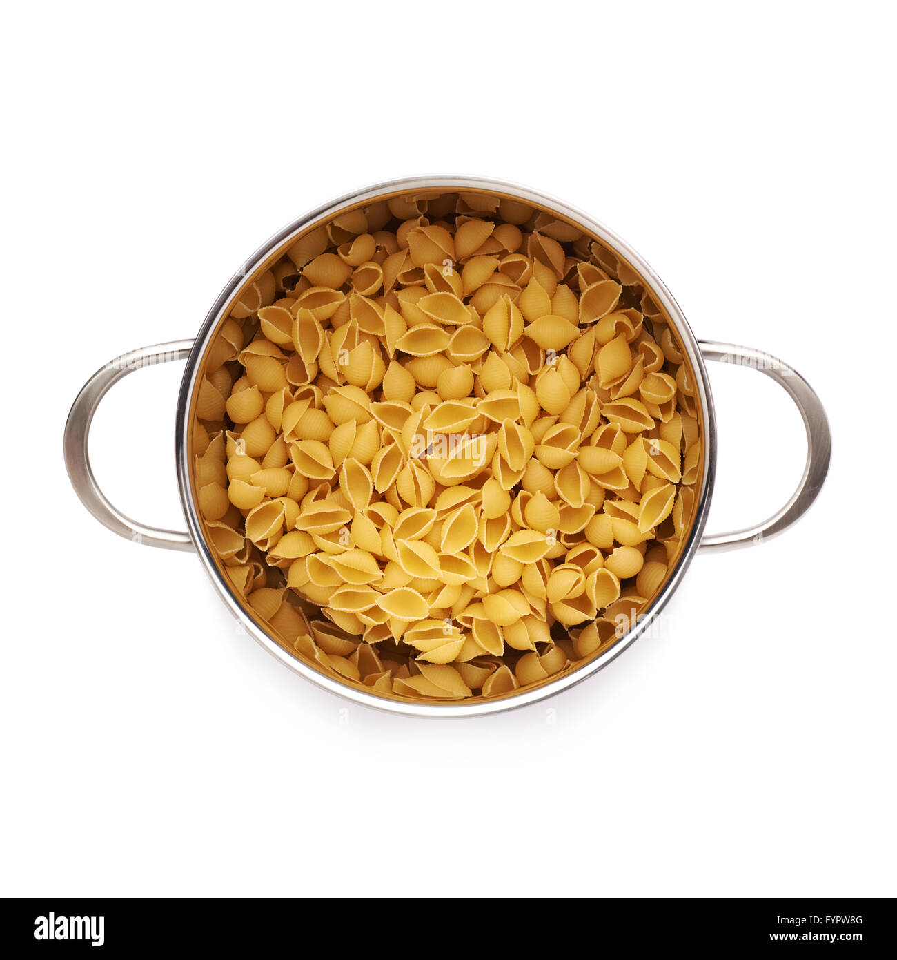 Metal pan filled with dry conchiglie pasta over isolated white ...