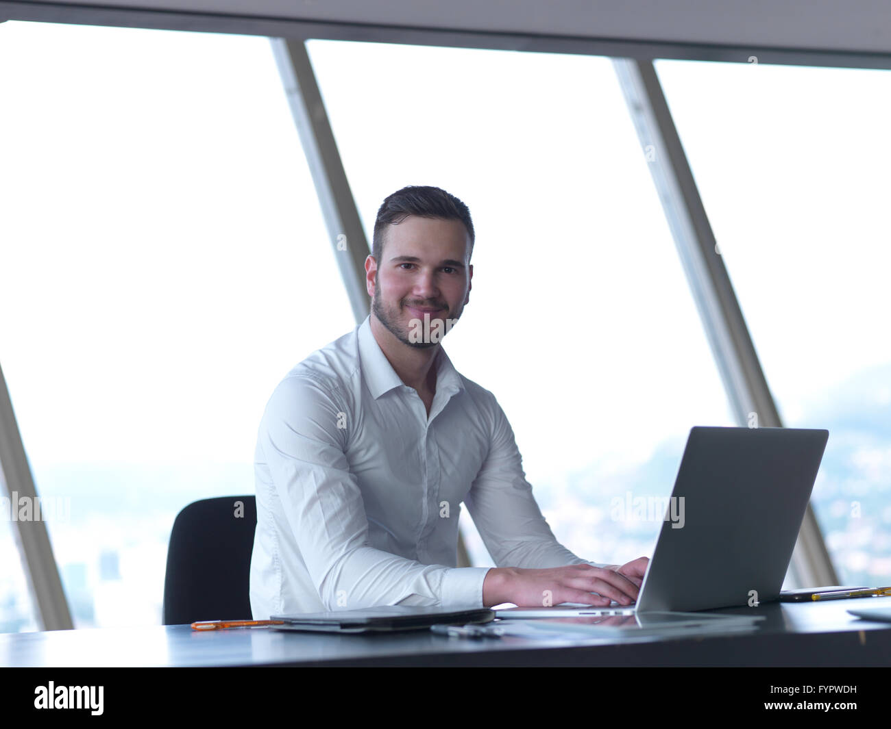 young business man at office Stock Photo - Alamy