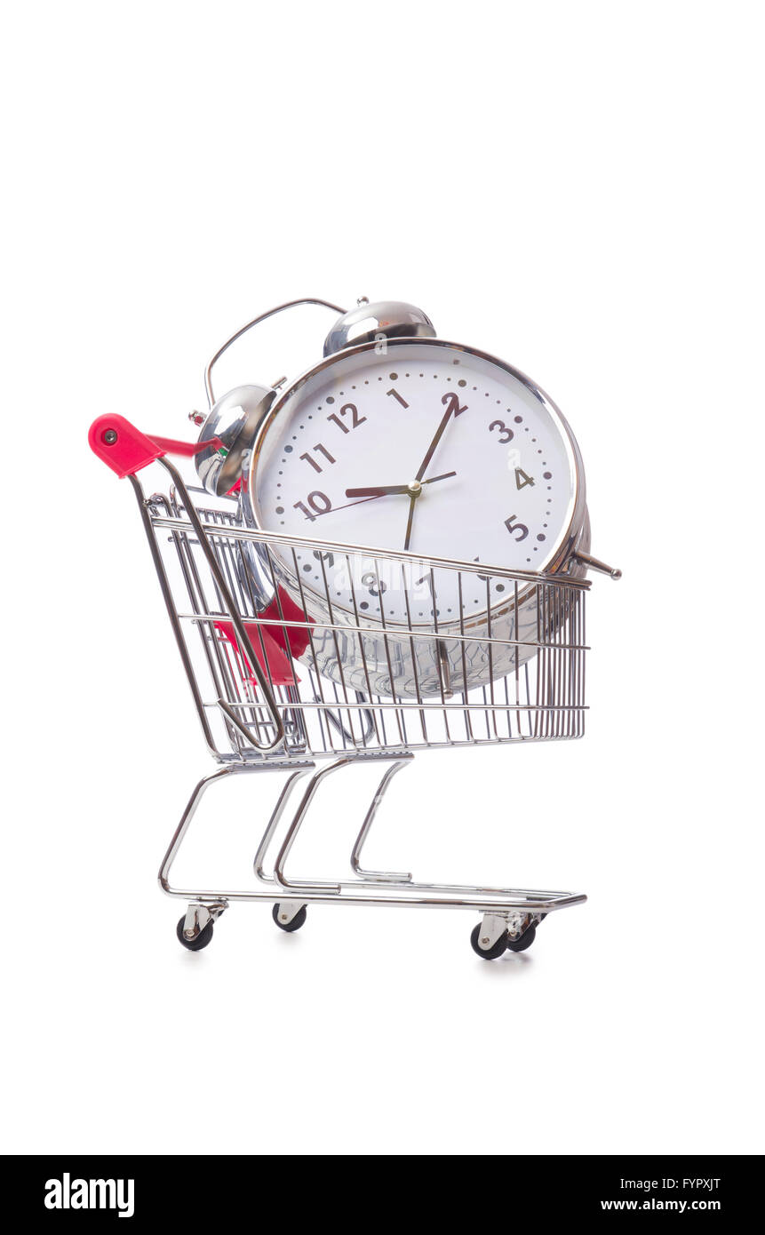 The big alarm clock in shopping cart on white Stock Photo - Alamy