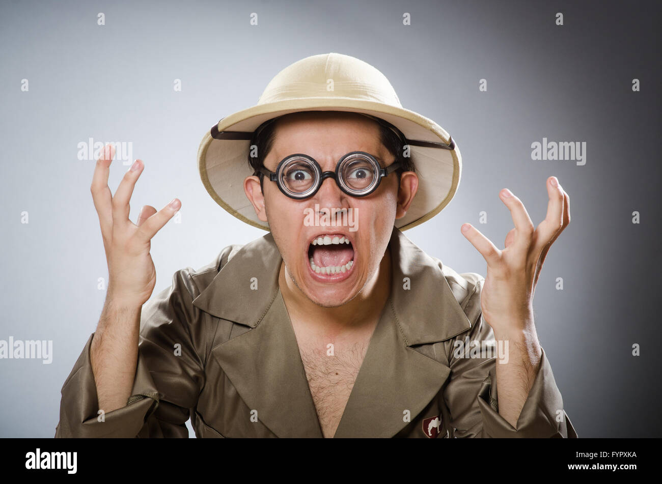 The funny safari traveller in travelling concept Stock Photo - Alamy