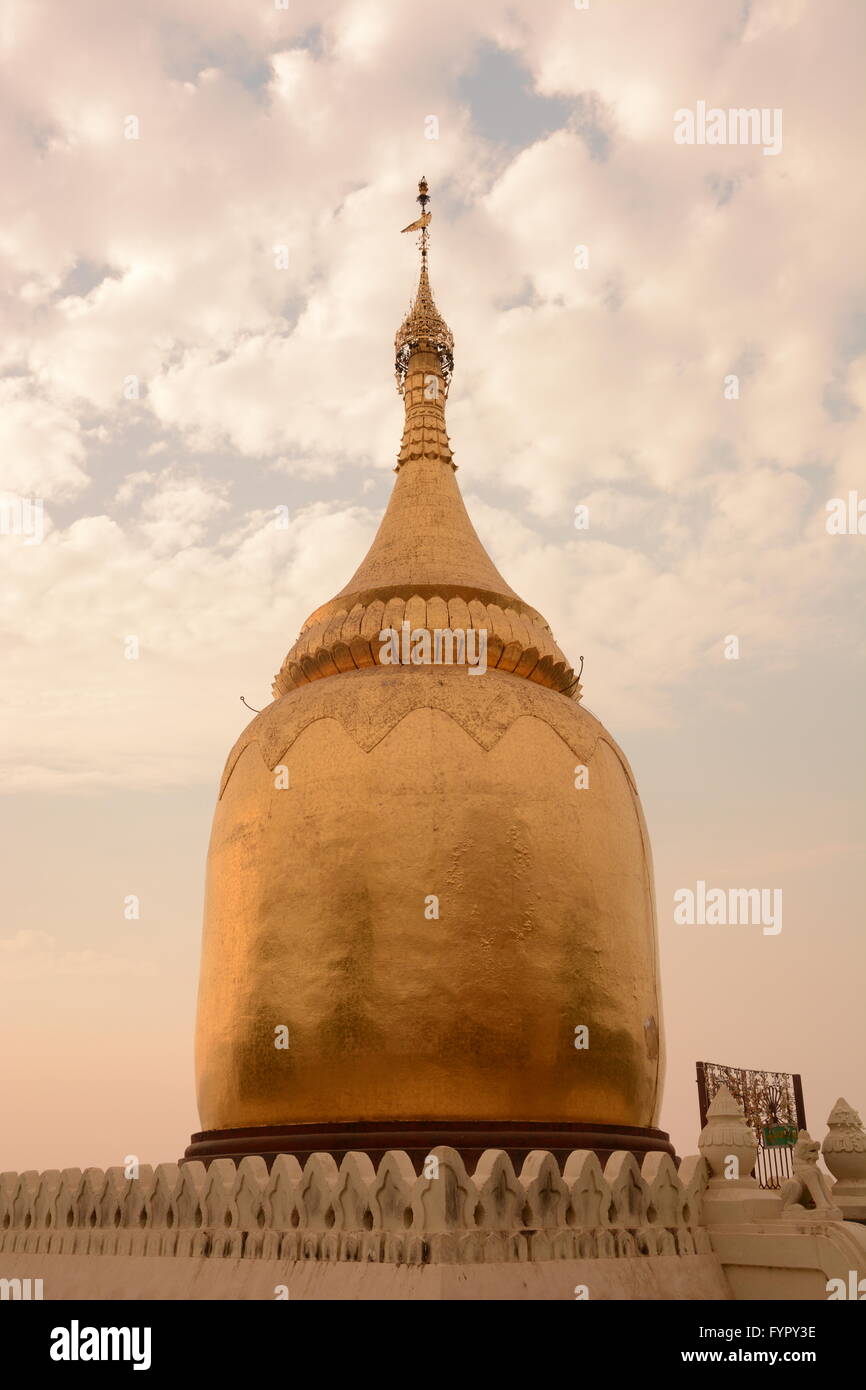 Ancient golden stupa, built along the Irrawaddy river in Bagan, Myanmar ...