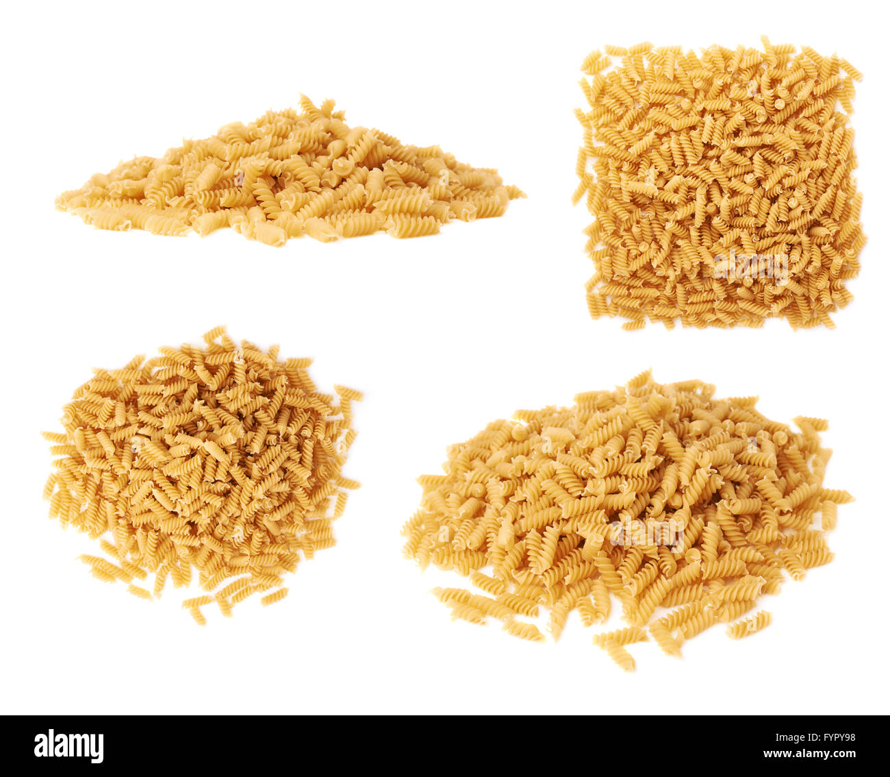 Pile of dry rotini pasta over isolated white background Stock Photo - Alamy