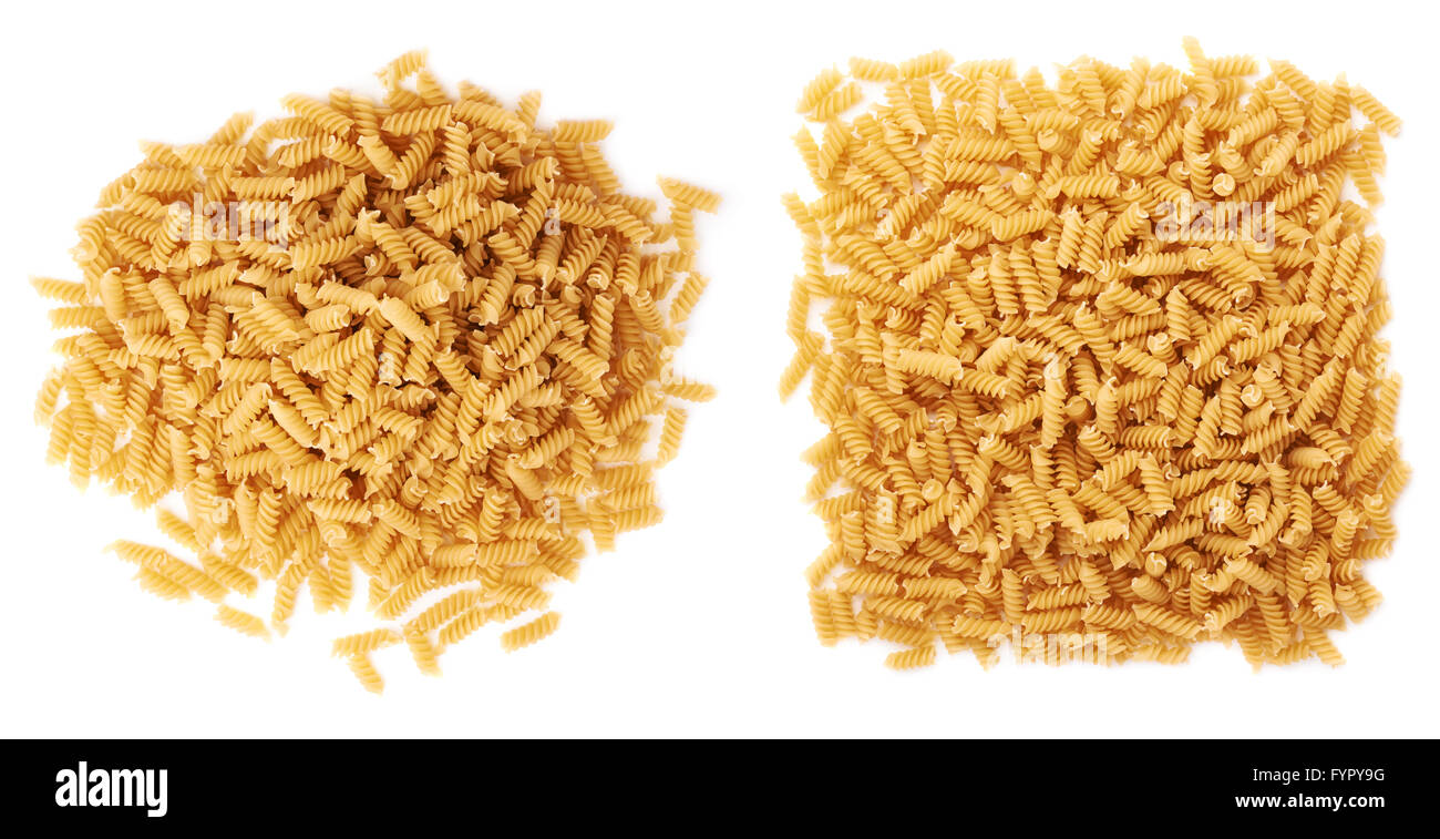 Pile of dry rotini pasta over isolated white background Stock Photo - Alamy
