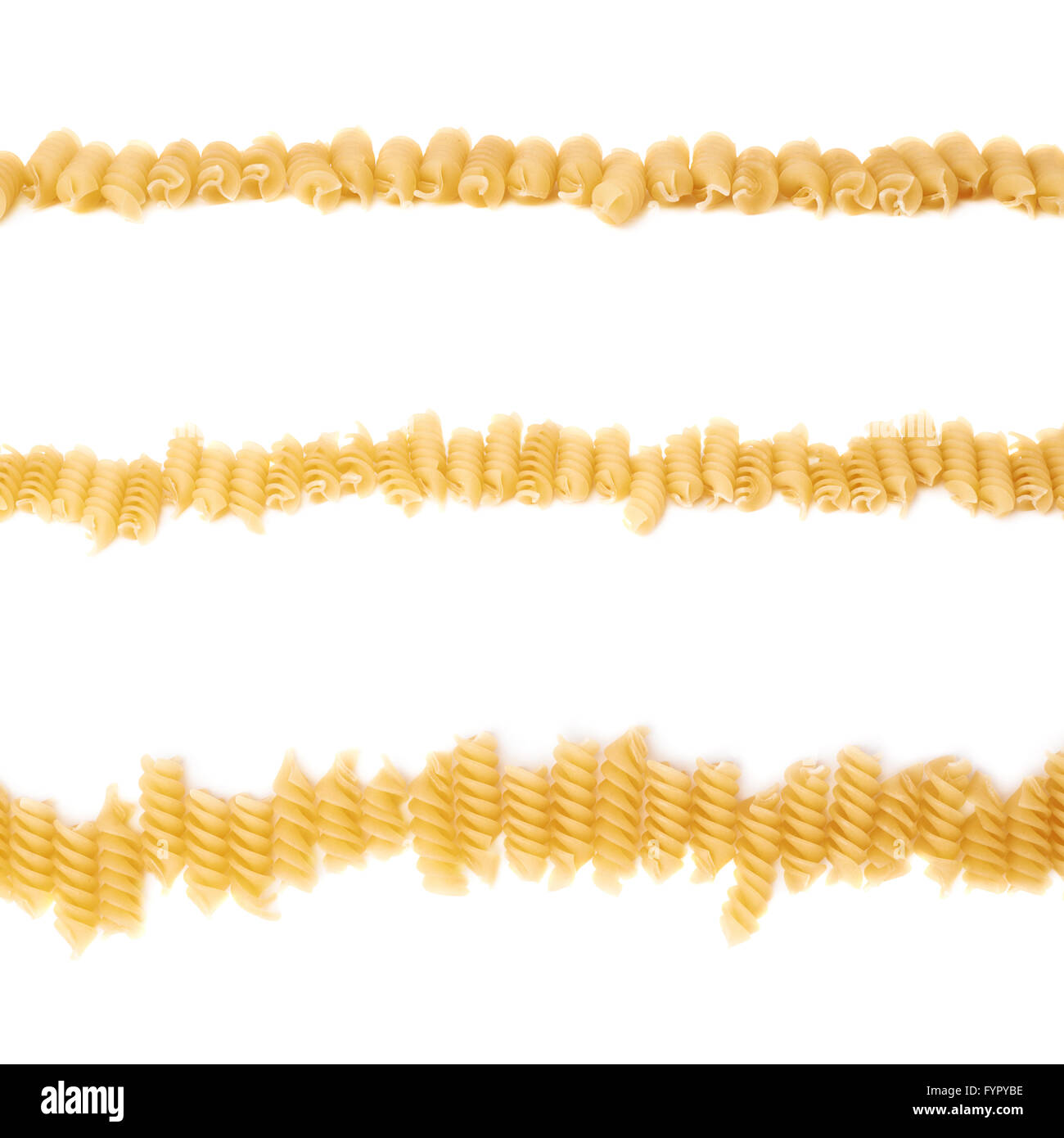 Line made of dry rotini pasta over isolated white background Stock ...