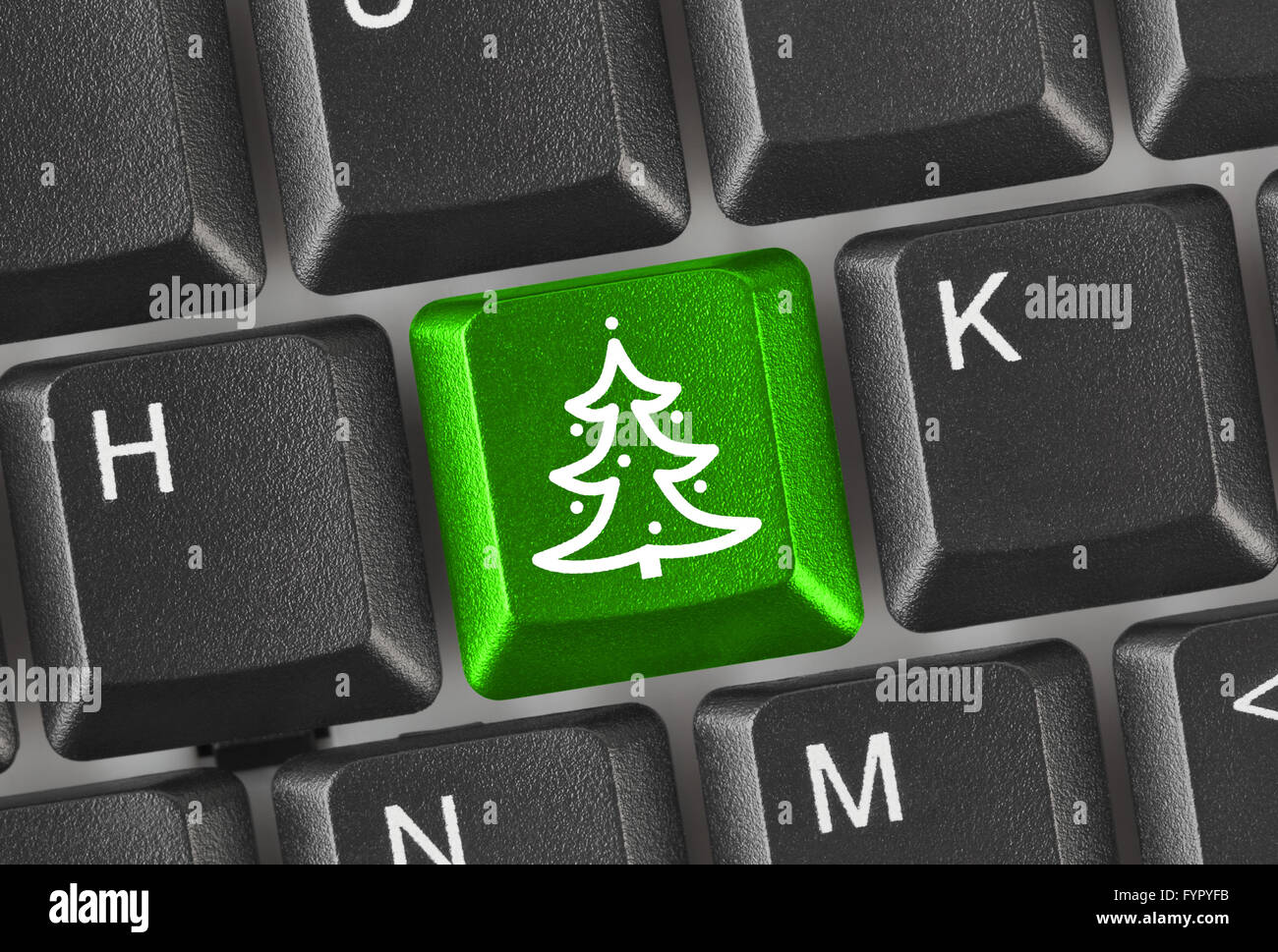 Computer keyboard with Christmas tree key Stock Photo - Alamy