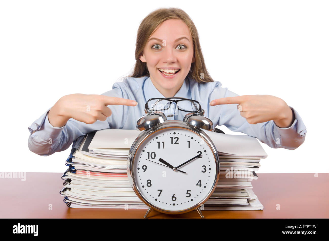Office employee showing alarm clock isolated on white Stock Photo - Alamy