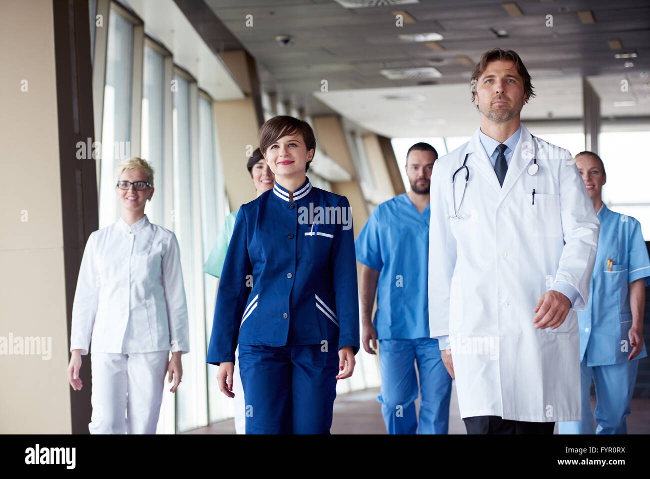 Group of female nurses walking hi-res stock photography and images - Alamy
