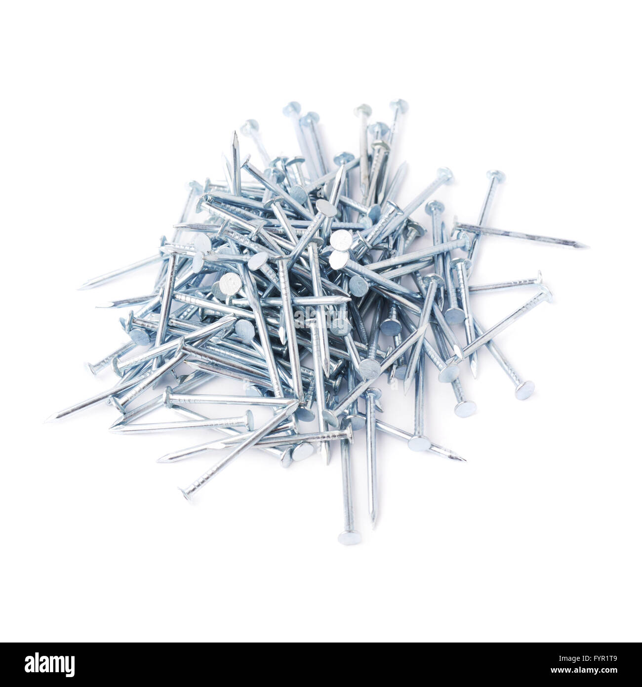 Pile of nails isolated over white background Stock Photo - Alamy