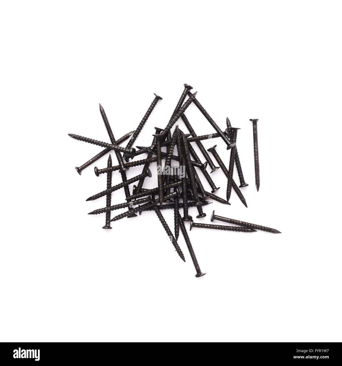 Pile of nails isolated over white background Stock Photo - Alamy