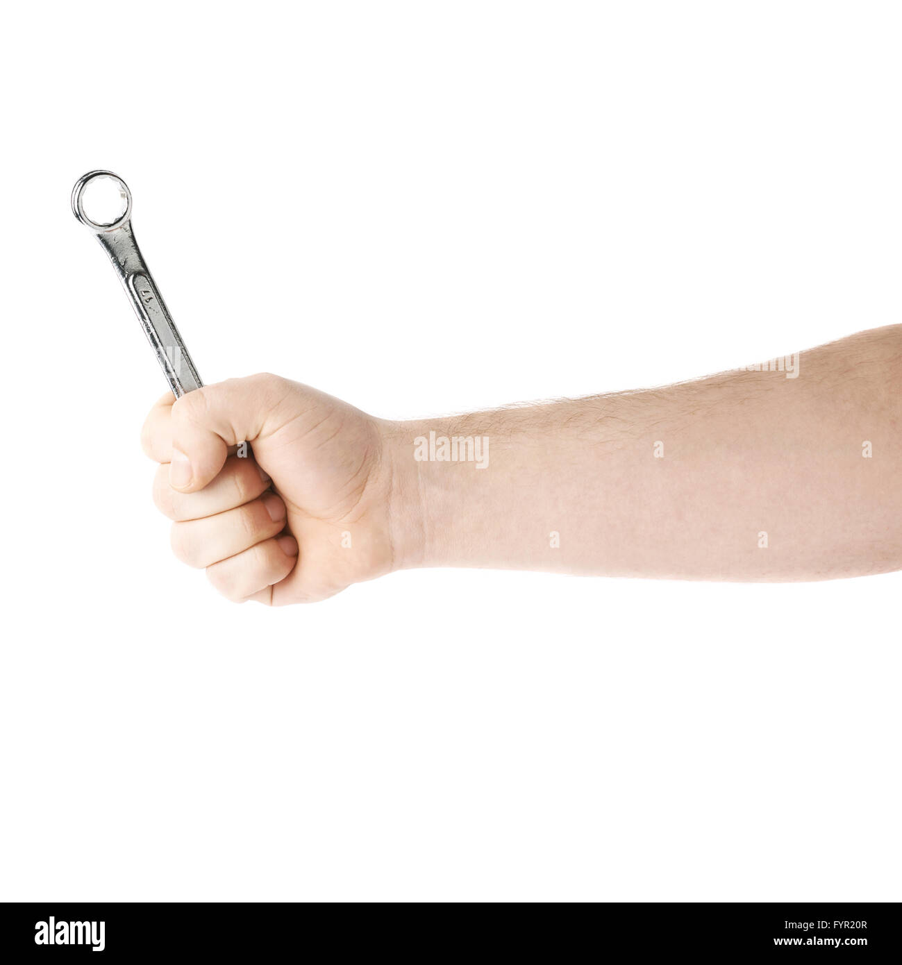 Hand holding a wrench tool, composition isolated over the white ...