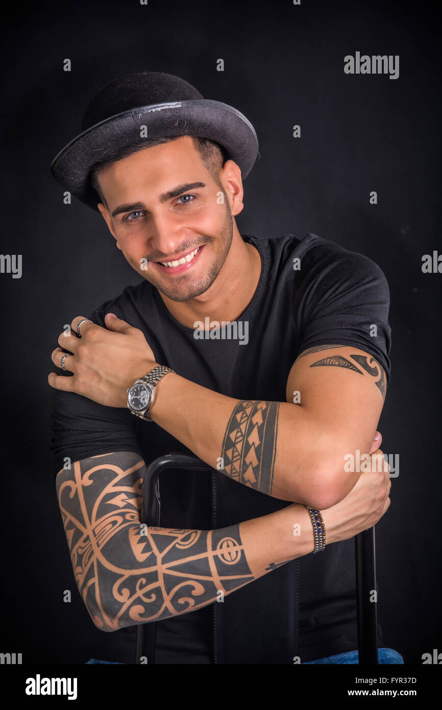 Handsome guy with tattoos hi-res stock photography and images - Alamy