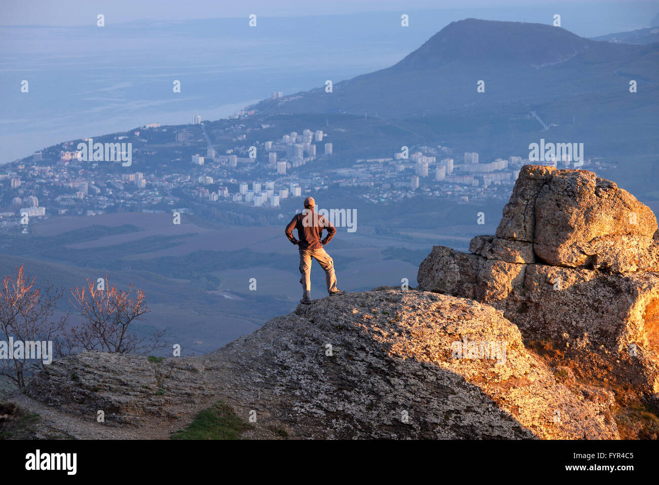 Man on the top of the mountain Stock Photo - Alamy