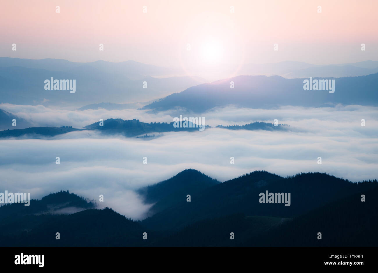 Mountains ridge at foggy morning Stock Photo - Alamy