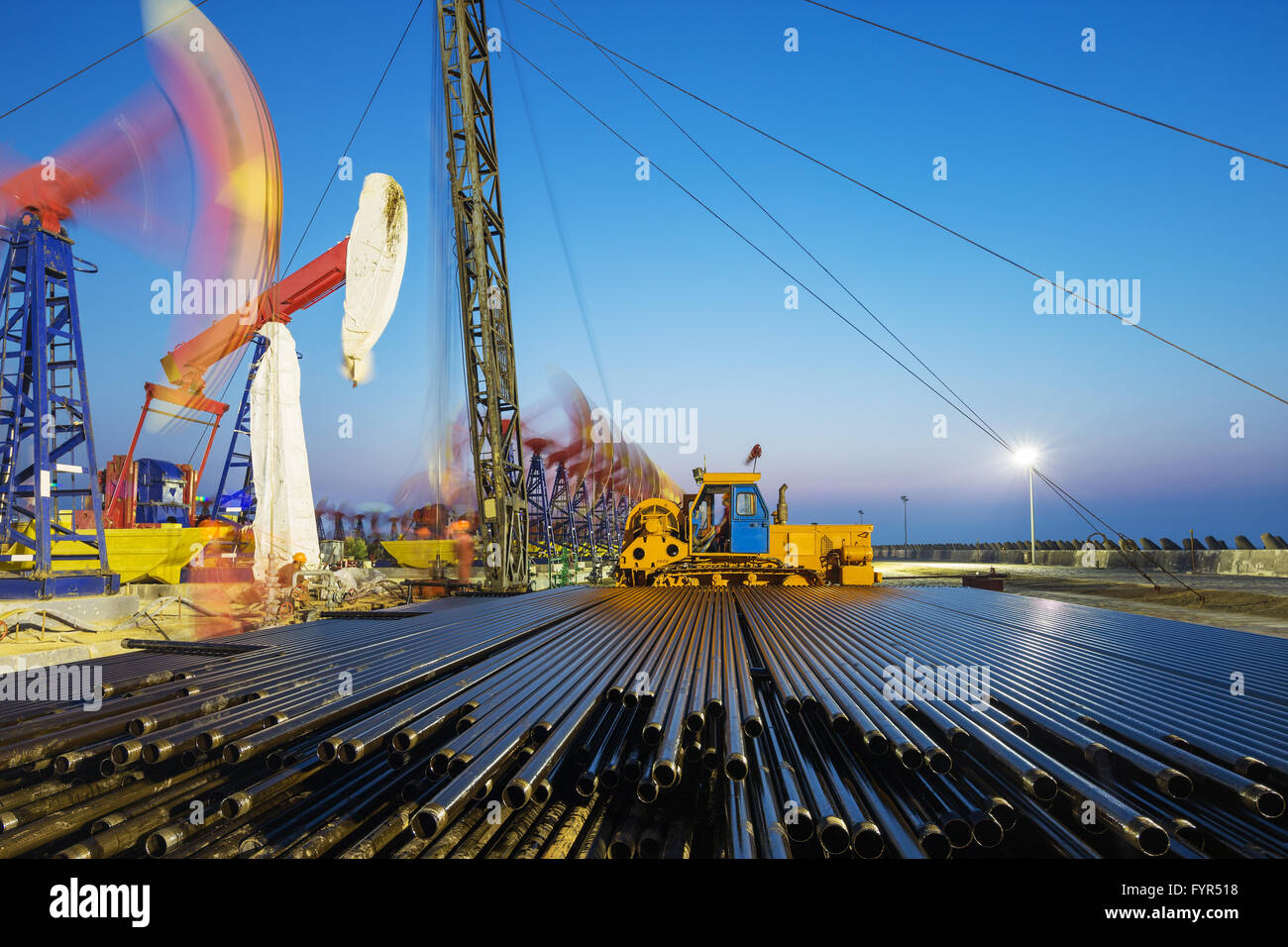oil-rig of oilfield day and night Stock Photo - Alamy