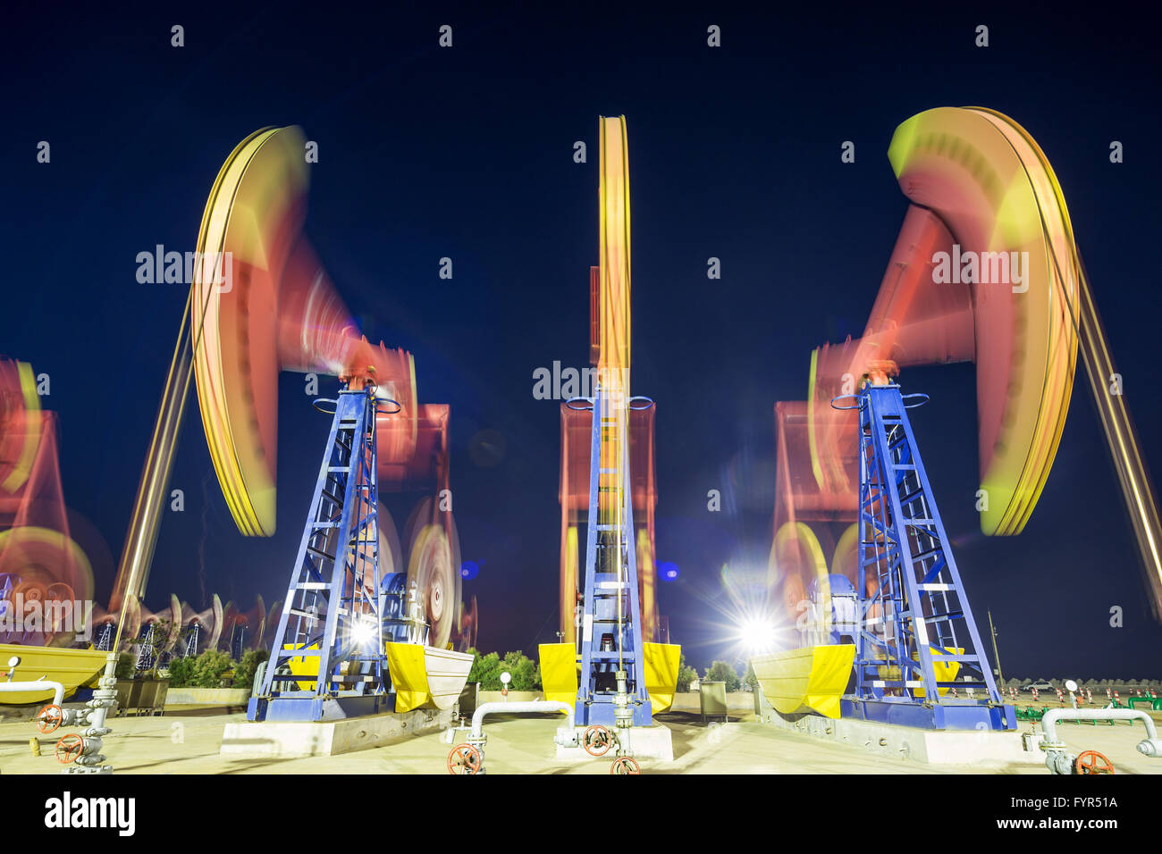 oil-rig of oilfield day and night Stock Photo - Alamy