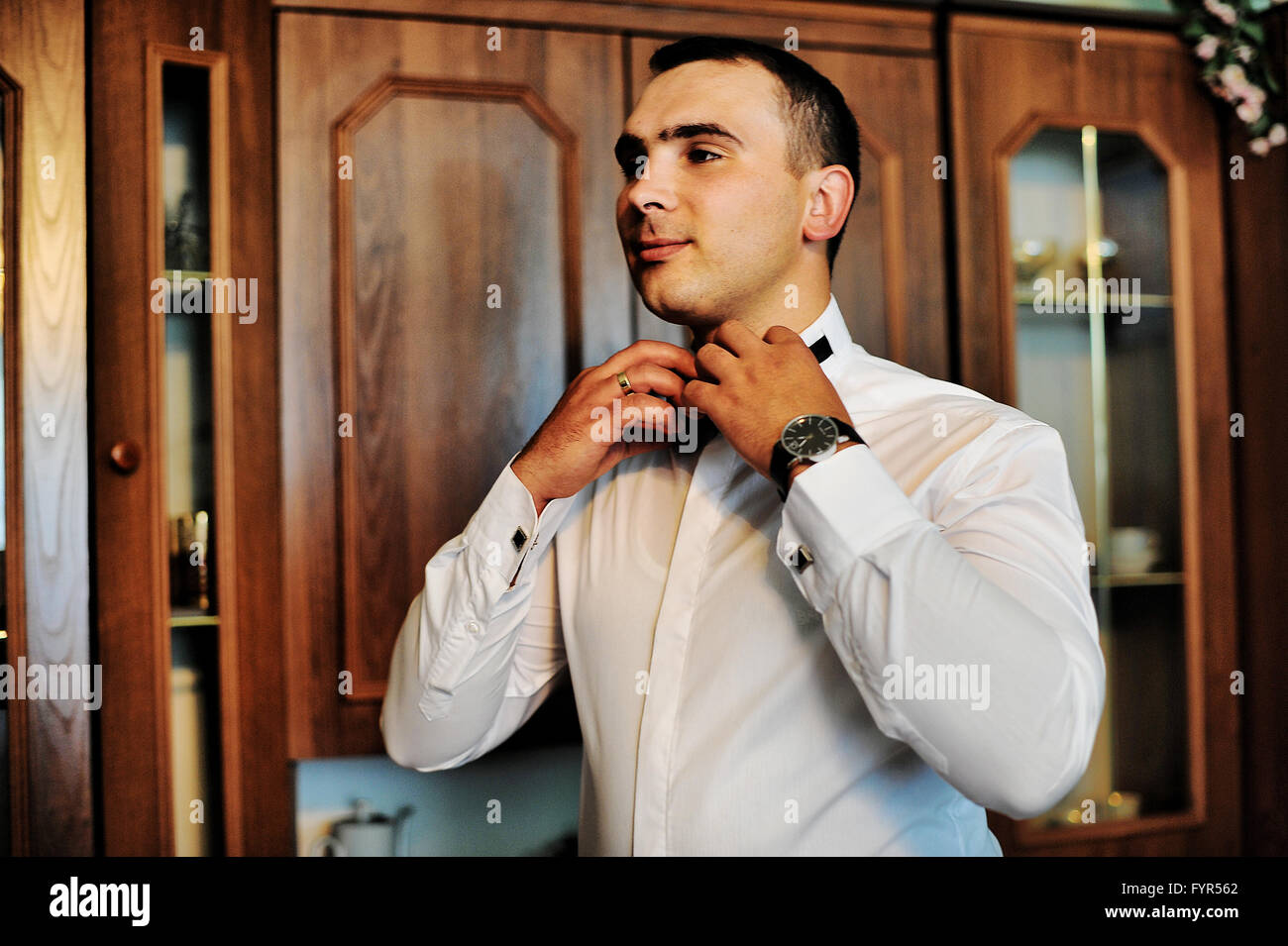 Wear tie hi-res stock photography and images - Alamy