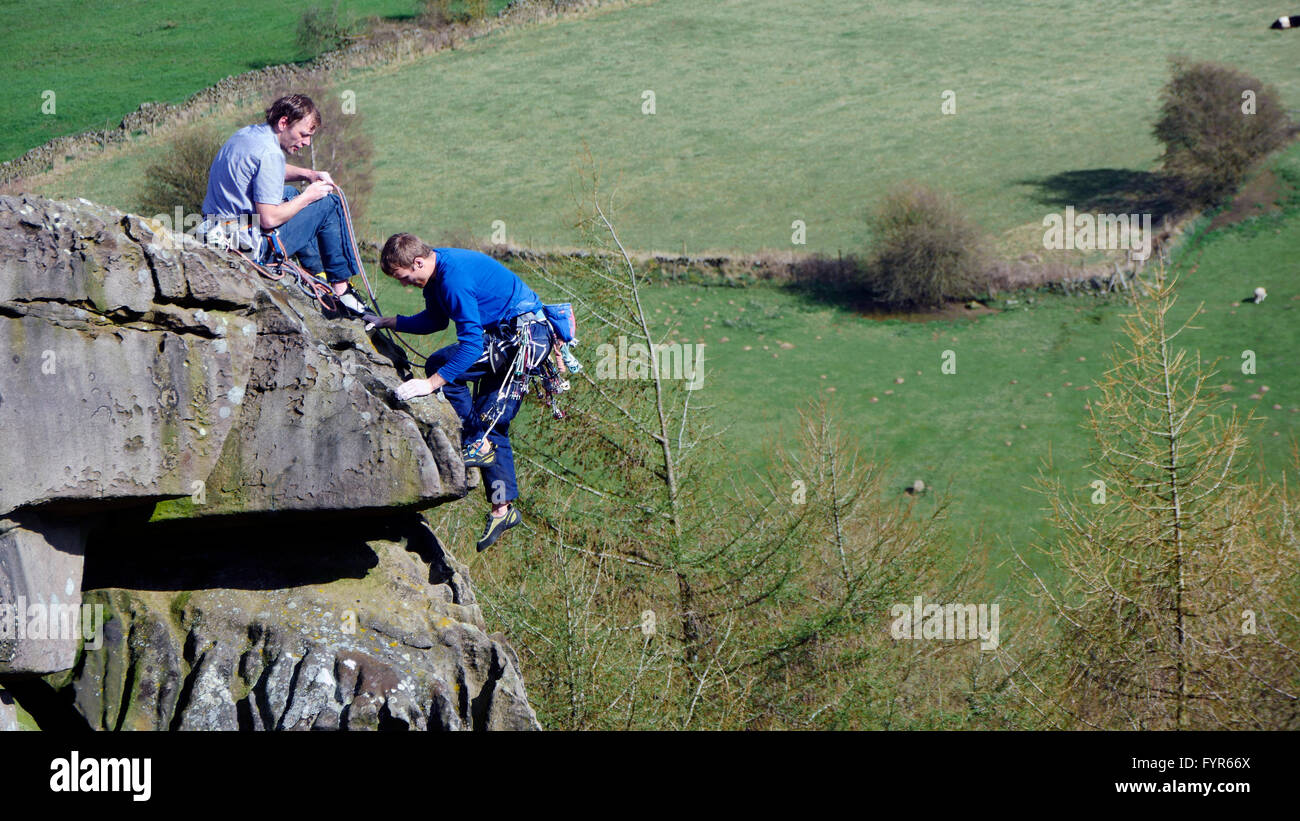 Rock climbers climbing at Robin Hood's Stride, Cratcliffe, Cliff Lane ...